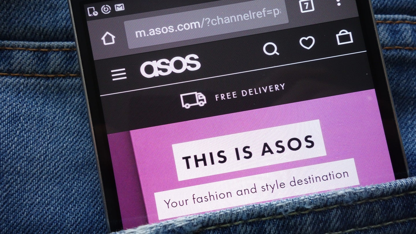 Asos reports smaller loss before tax and improved gross margin